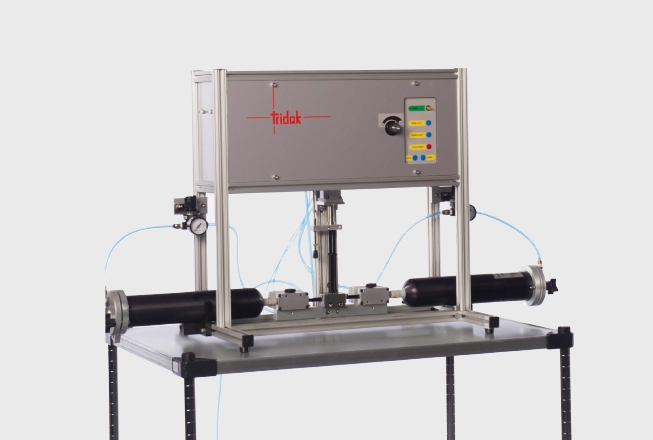 Tridak Model 1200 Syringe Filler | Tridak-Dymax Filling Equipment